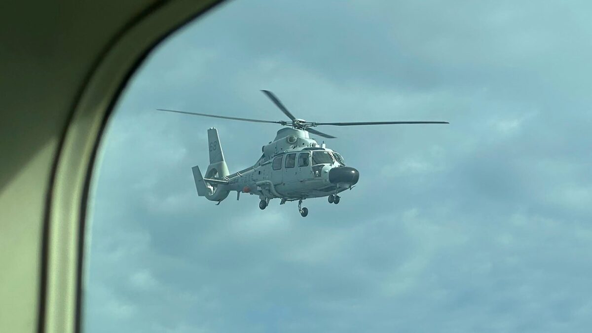 Chinese navy helicopter flies within 10 feet of Philippine patrol plane ...